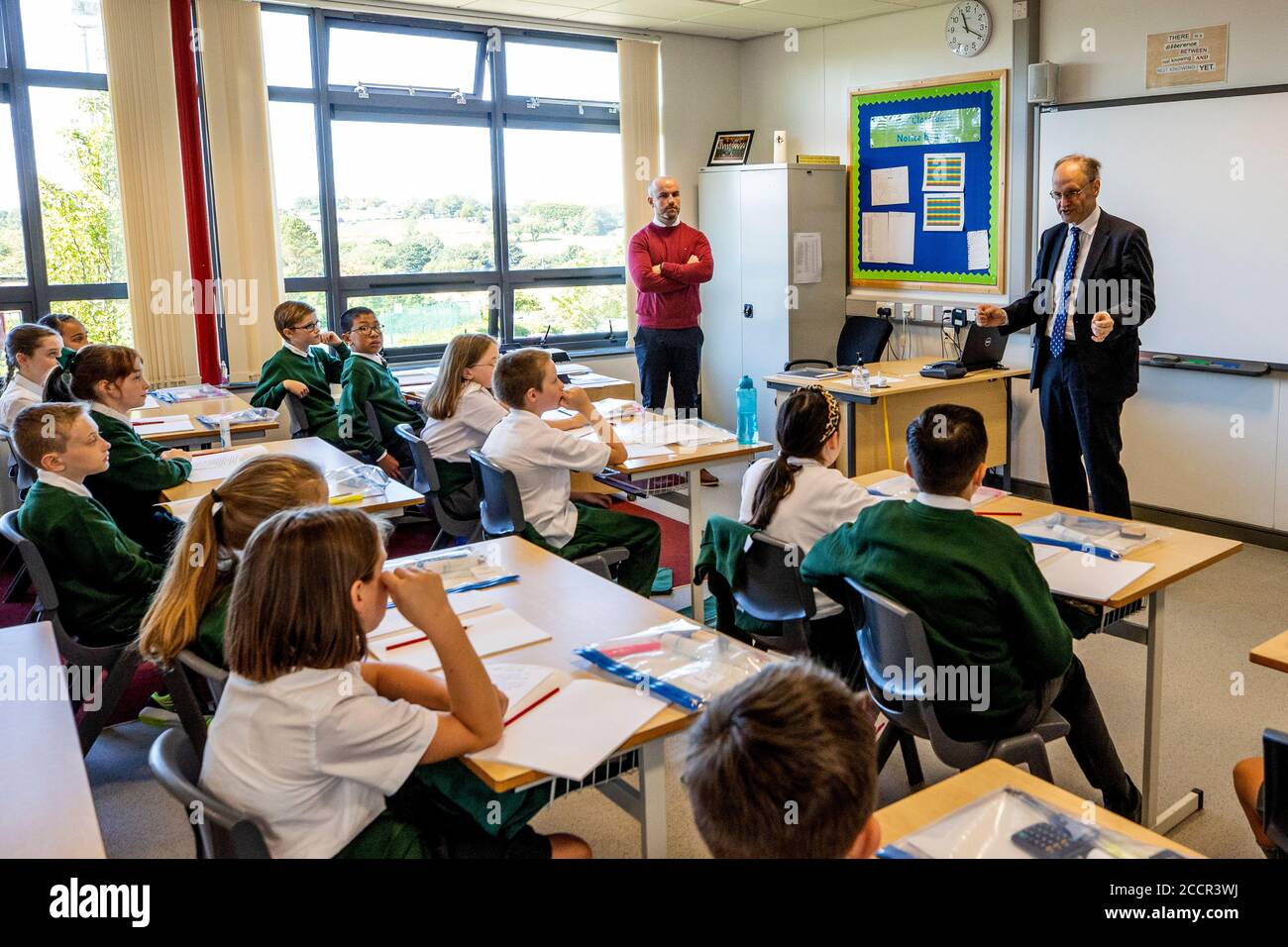 Education Minister Peter Weir talking with pupils at St Joesph's ...