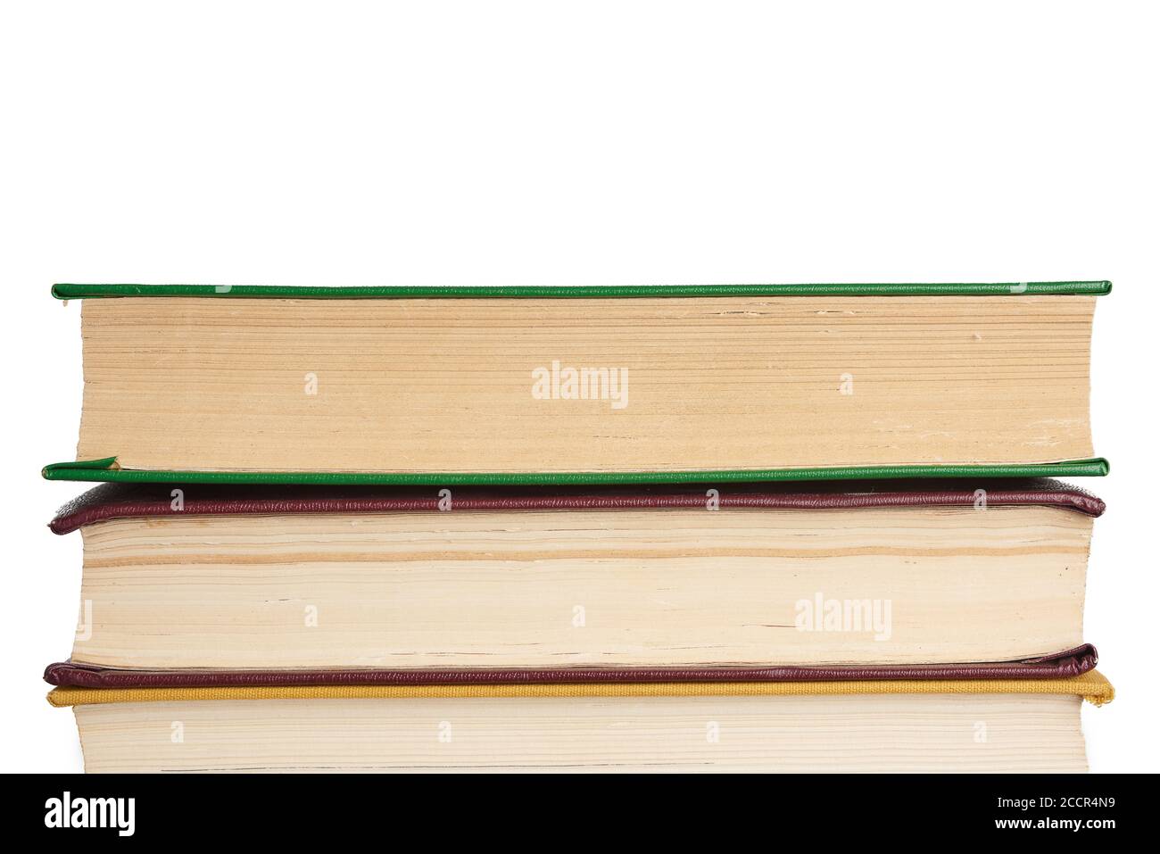 stack of various books, items are isolated on white background, close ...