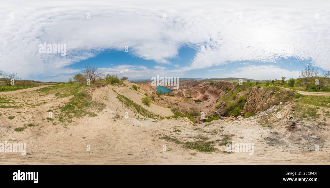 Spherical panorama of emerald lake in a flooded quarry. Emerald green ...