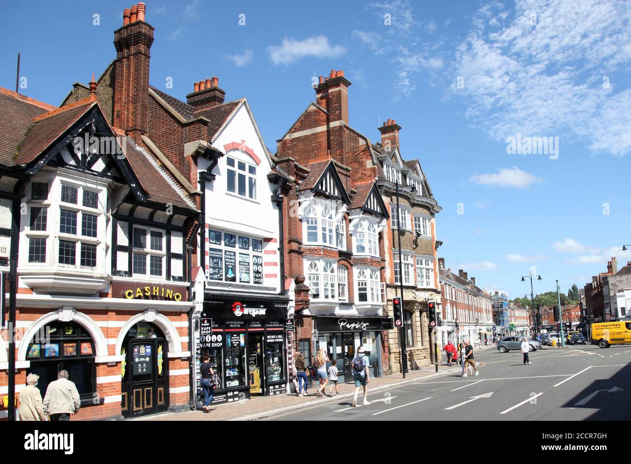 Shoppers at Epsom High Street junction with Ashley Road, town centre ...