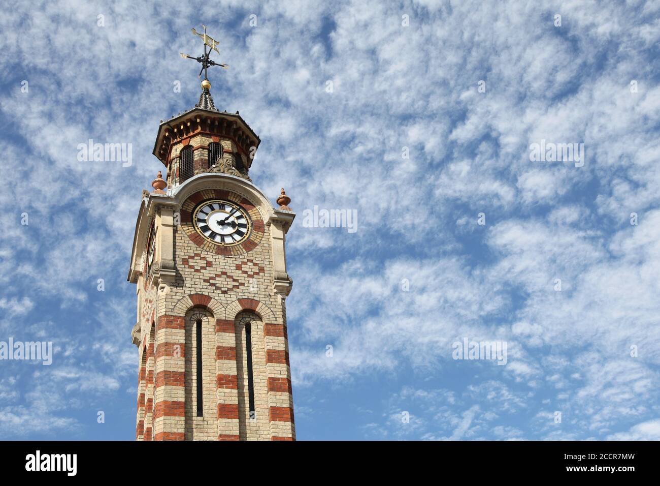 Built in 1847, the Epsom clock tower stand under dramatic clouds in ...