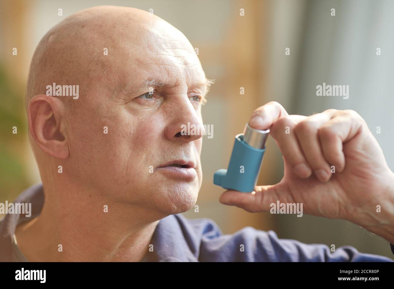 Old Man Holding Inhaler High Resolution Stock Photography and Images ...
