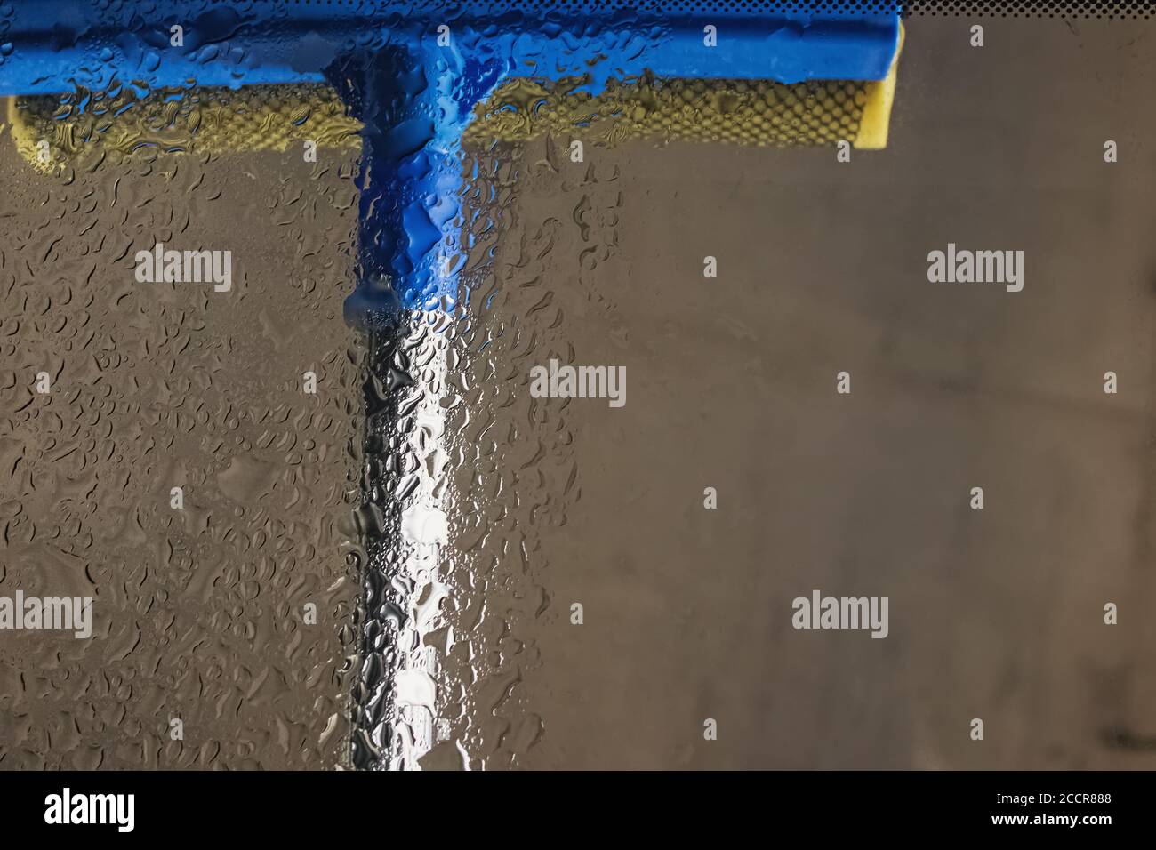 Removing Water From Car Window. Vehicle Cleaning, view from the inside ...