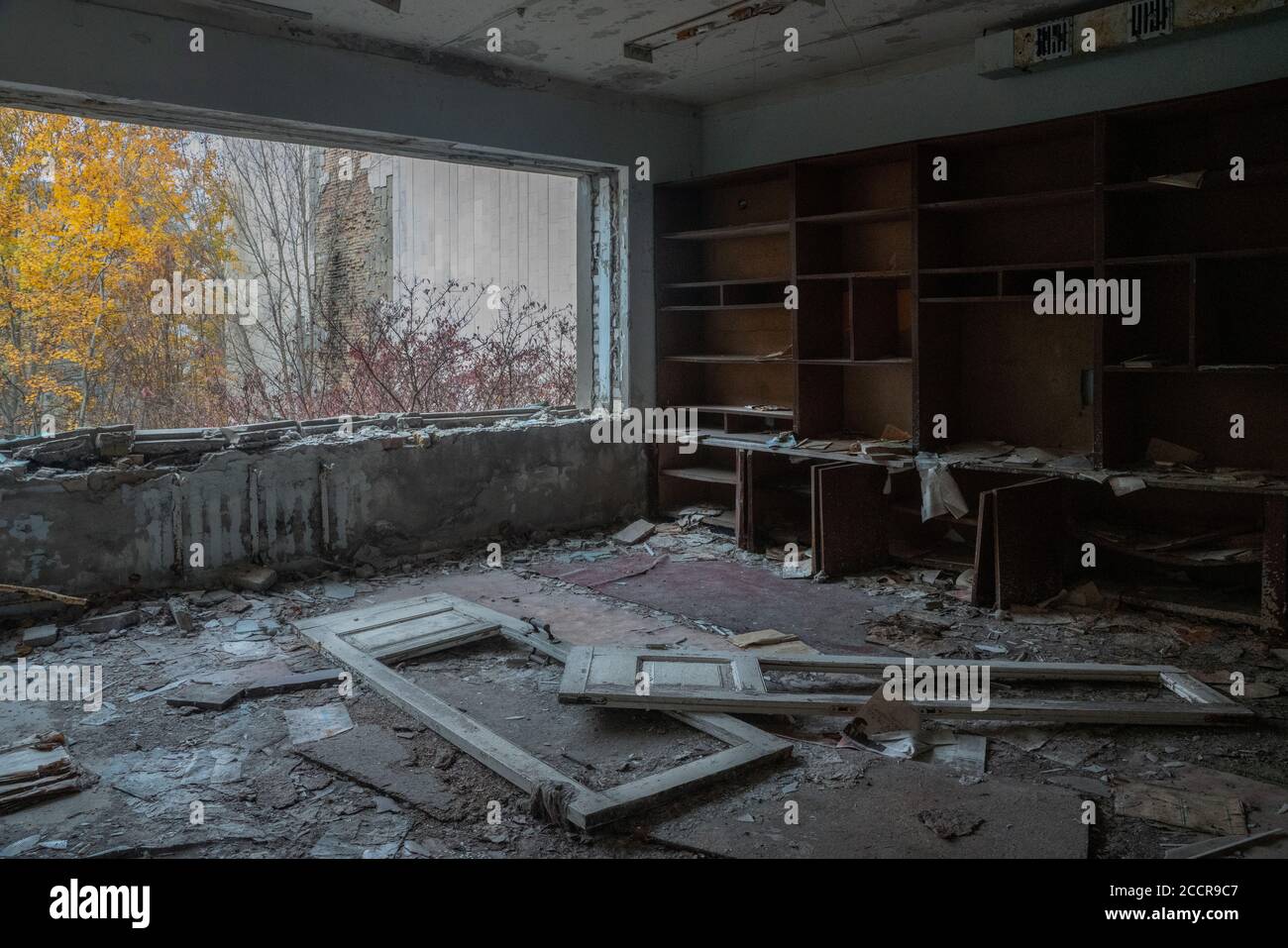 A classroom with destroyed furniture in an abandoned school in Pripyat ...