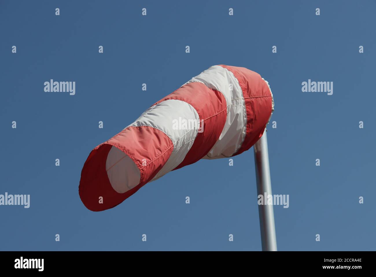 windsock,a conical textile tube that resembles a giant sock and can be ...