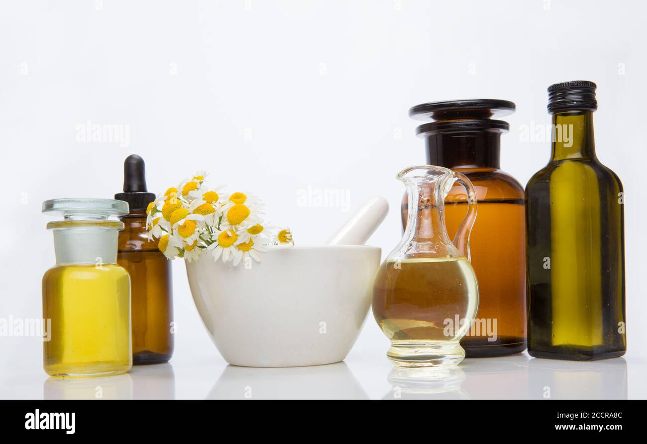 Natural Homeopathy Concept – Healing herbs in a mortar on white ...