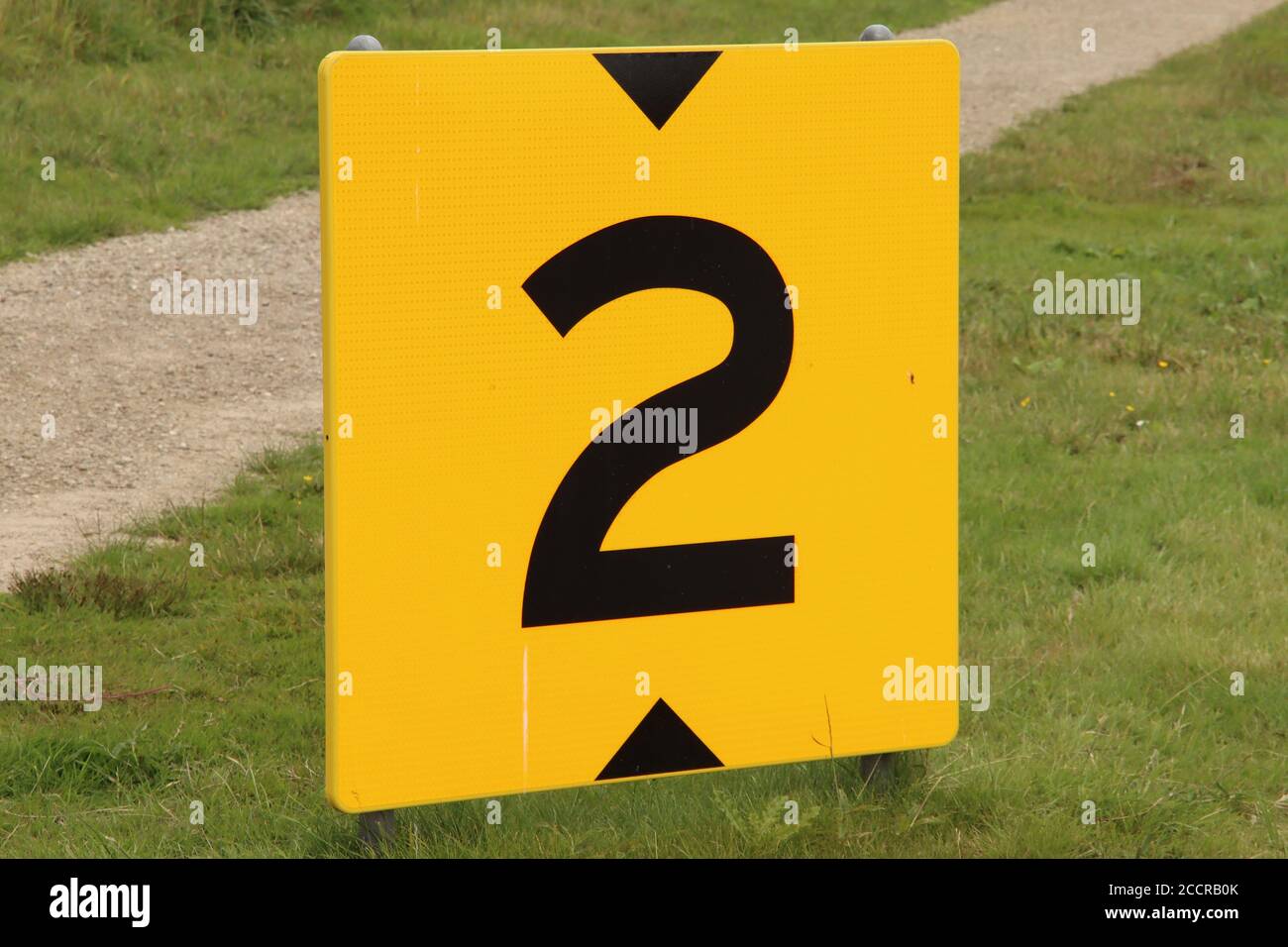Yellow sign at rowing facility in Zeven huizen with the number 2 Stock ...