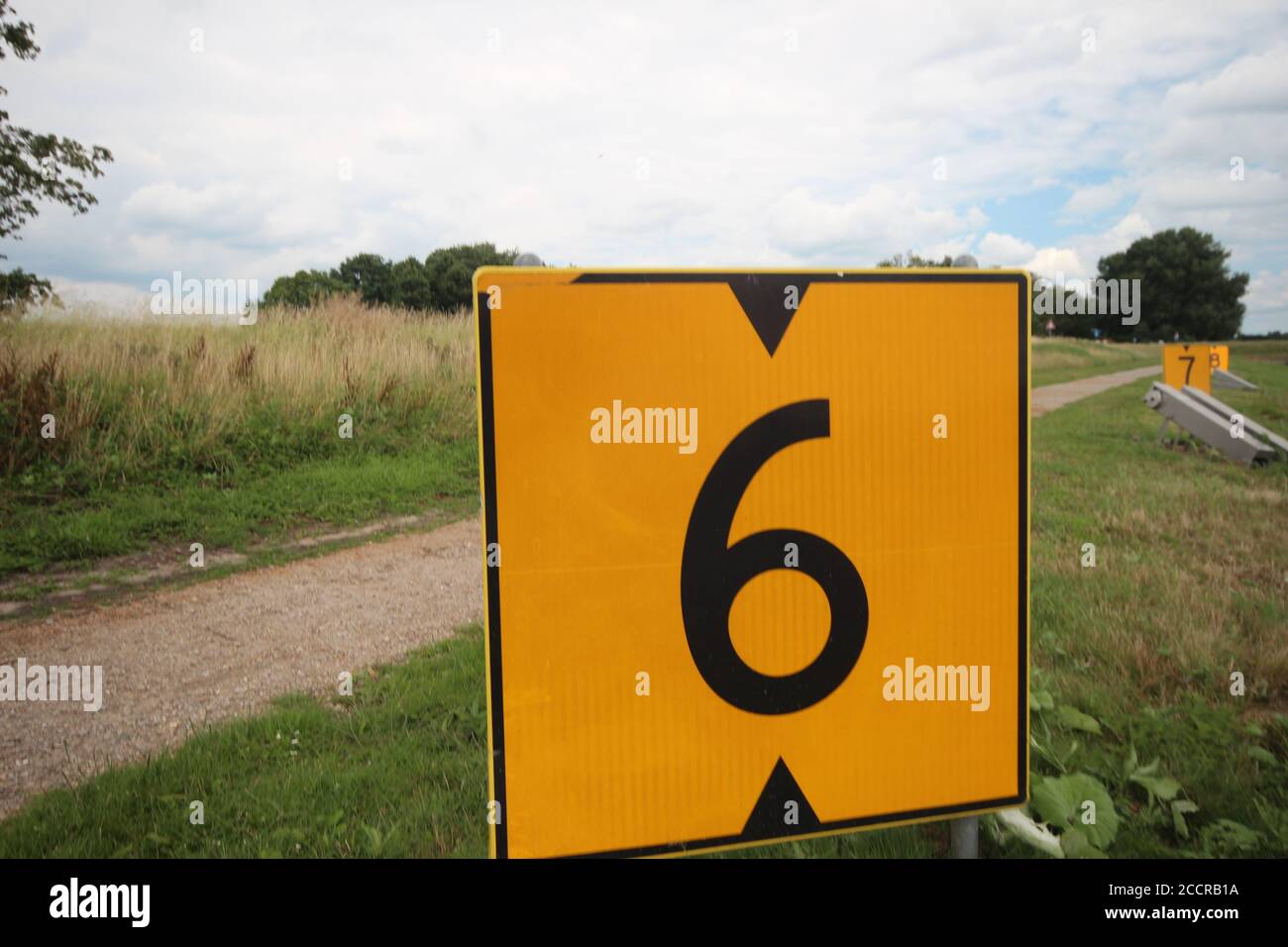 Yellow sign at rowing facility in Zeven huizen with the number 6 Stock ...