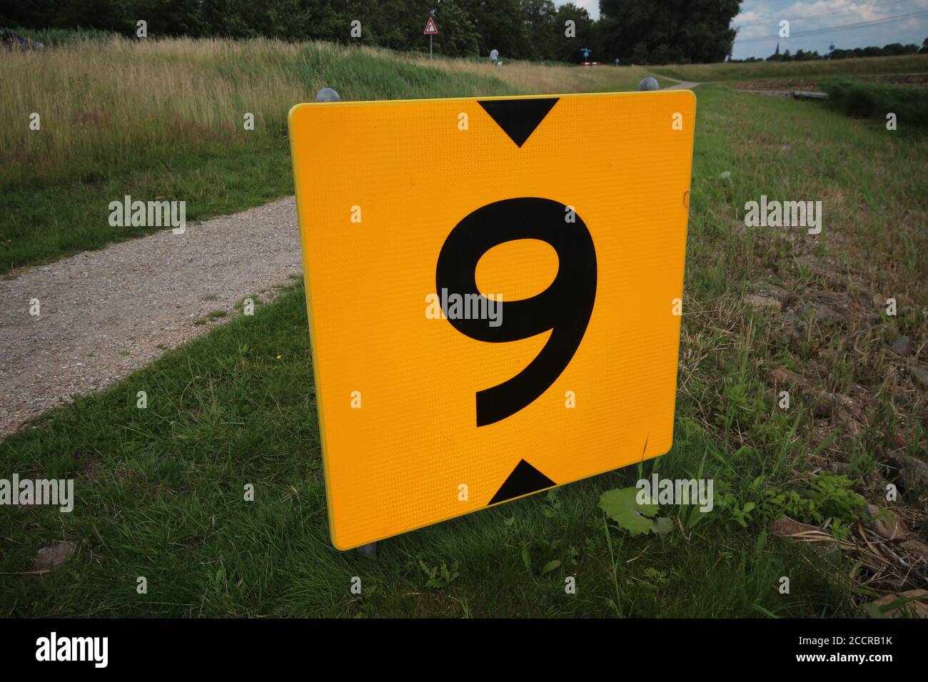 Yellow sign at rowing facility in Zeven huizen with the number 9 Stock ...