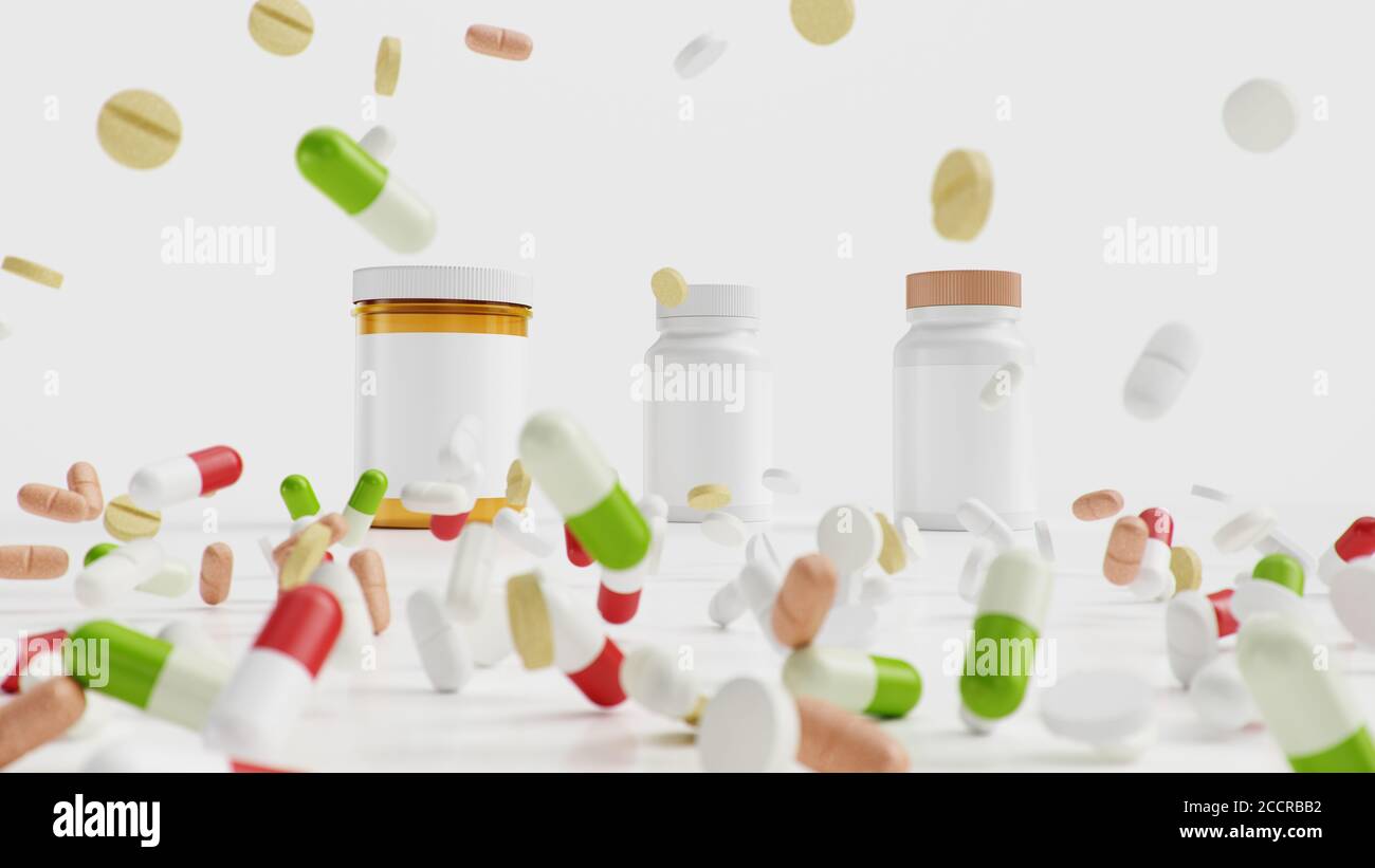 White medical capsules fall from hi-res stock photography and images ...