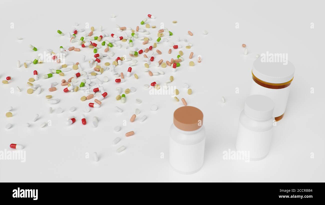 Pills on the floor with jars, different colored tablets, capsules ...