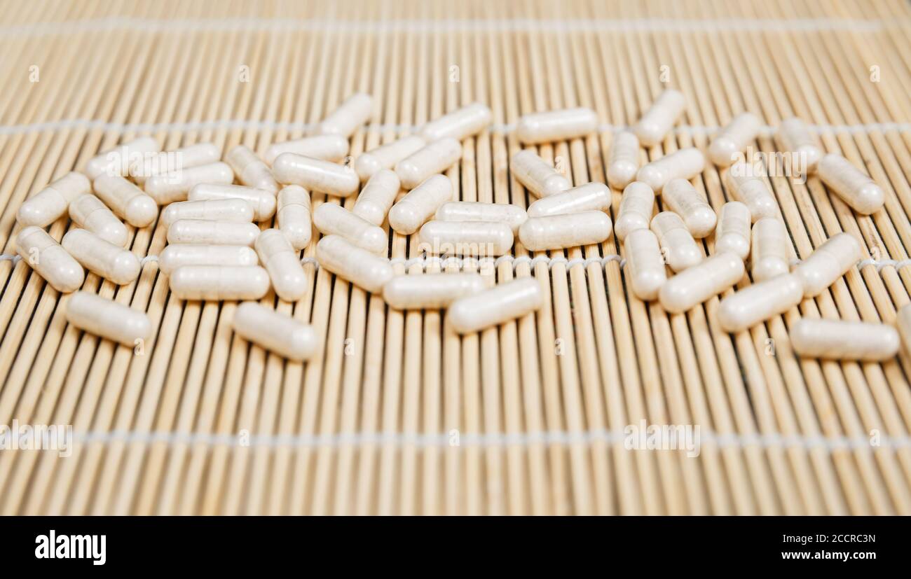 Alternative medicine tablets Stock Photo - Alamy