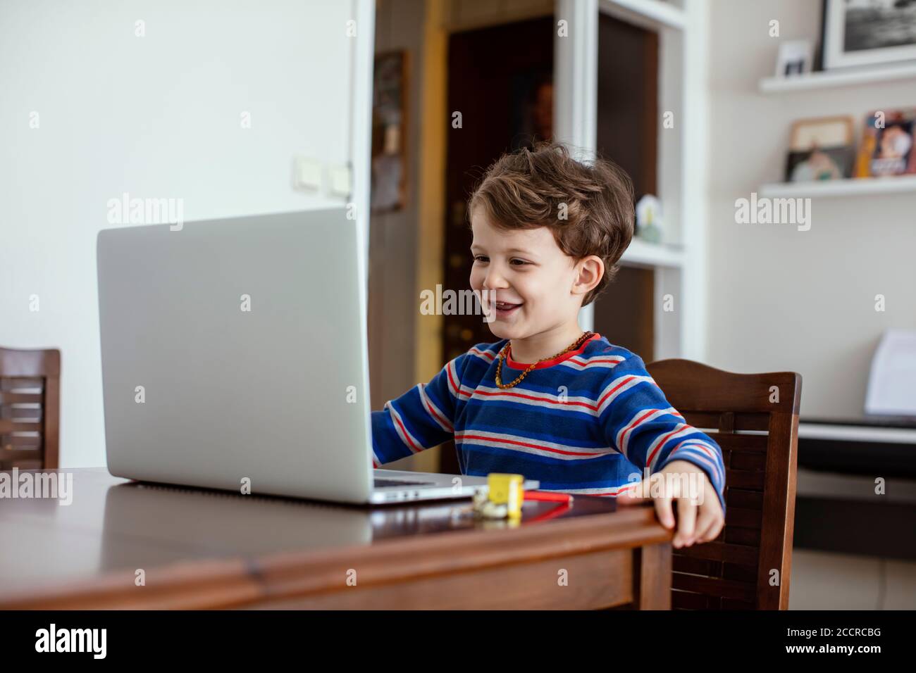 Child Staring At Computer High Resolution Stock Photography and Images ...