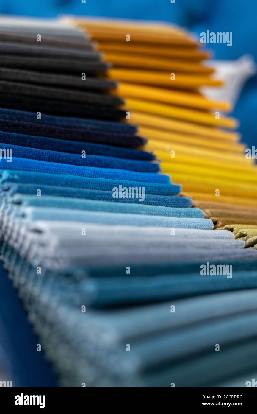 Luxury velvet samples folded in gradient colors for customers to choose ...