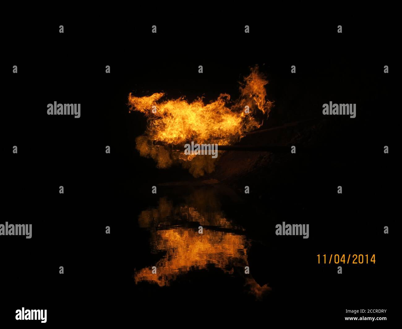 Fire reflection and black background Stock Photo - Alamy