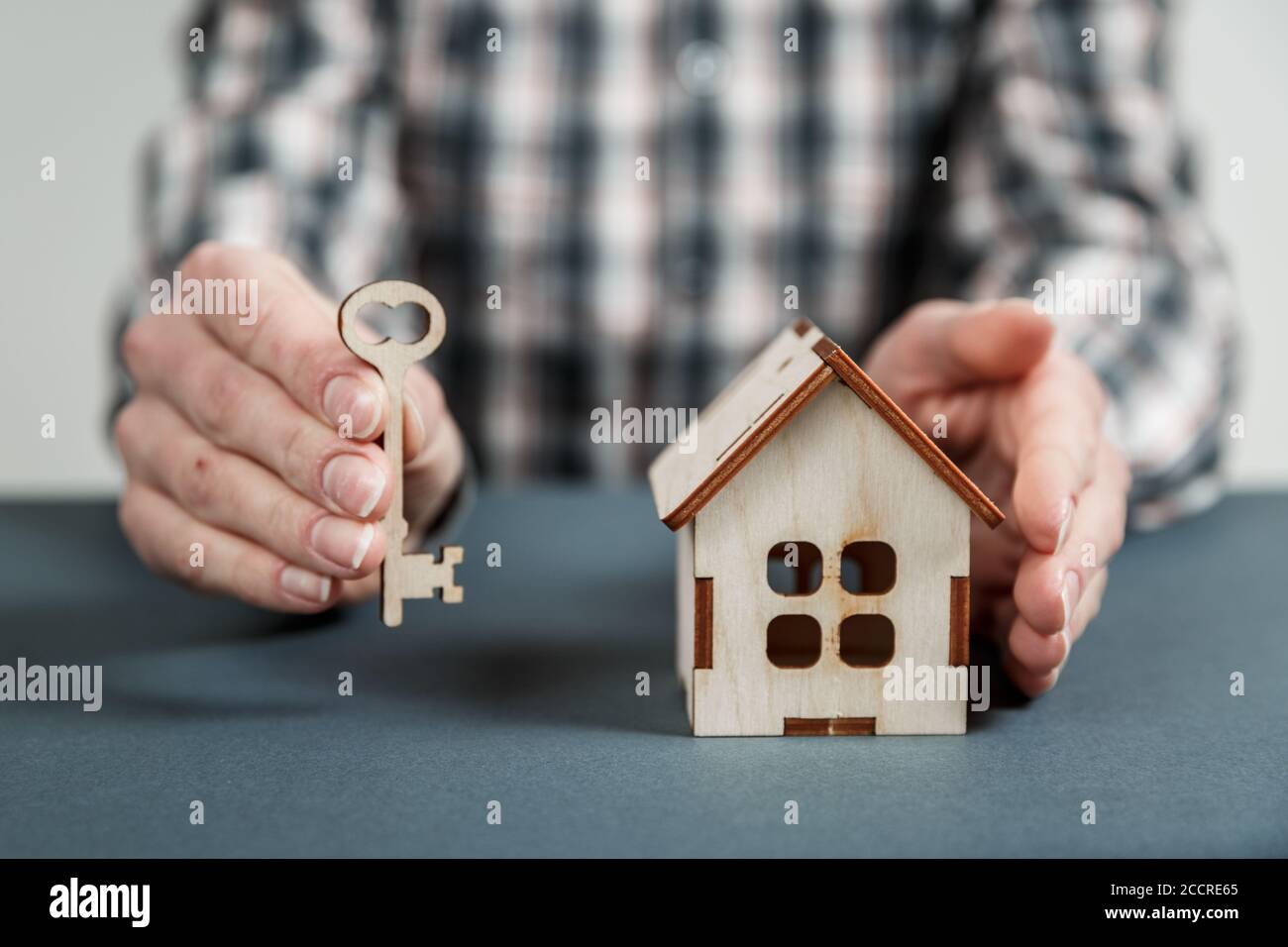 Symbol of the house with key Stock Photo - Alamy
