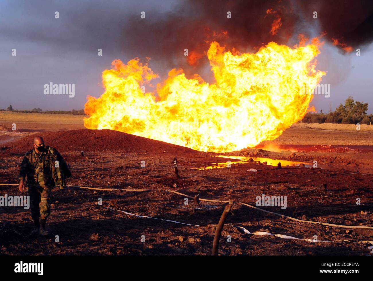 Damascus, Syria. 24th Aug, 2020. Fire is seen at the al-Arabi gas ...