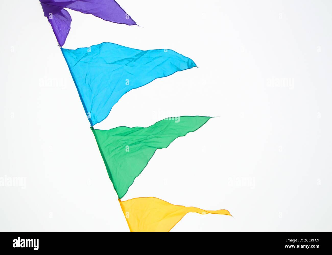 Fairground triangle flag hanging on a rope for a fun party Fiesta event ...