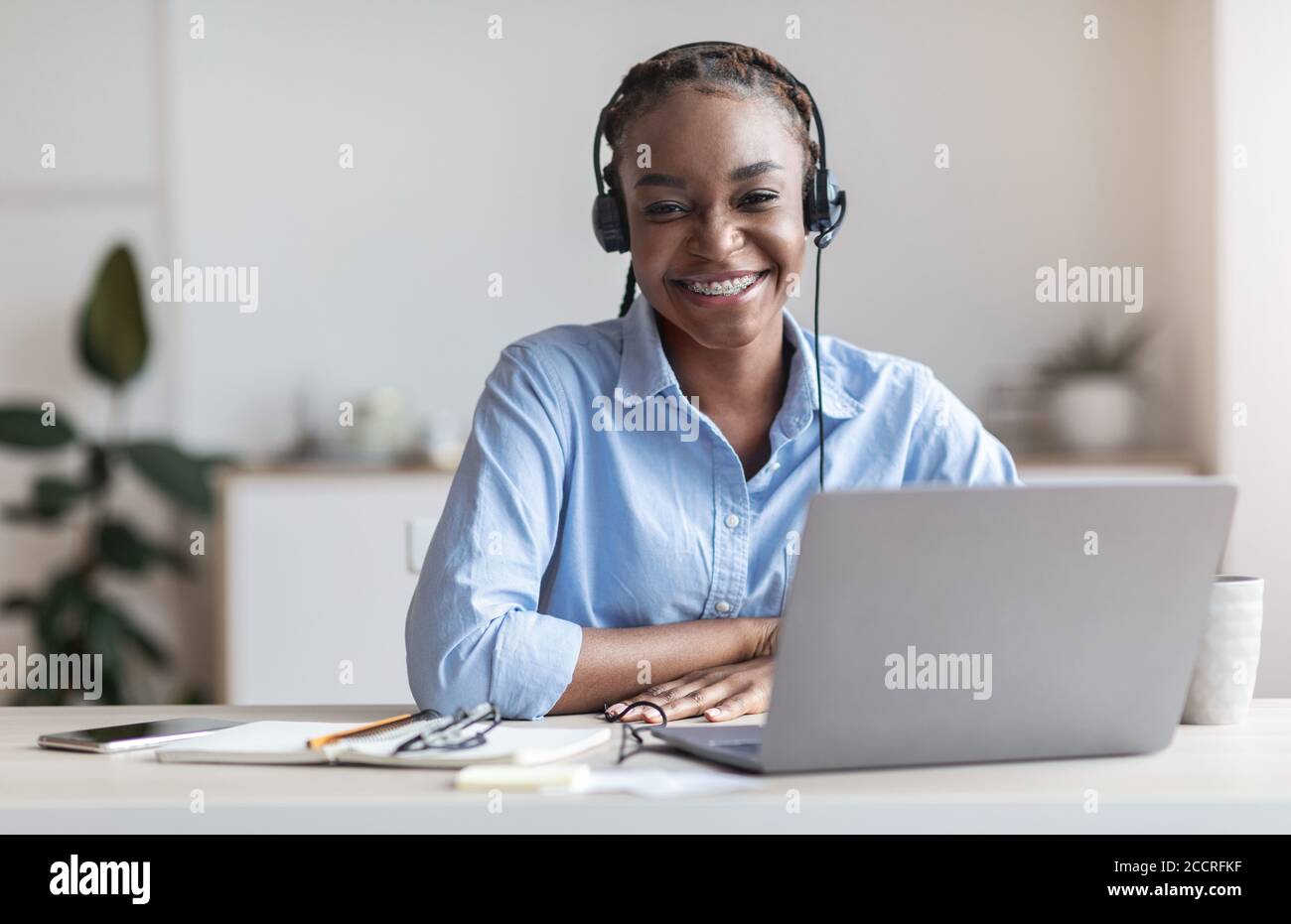Portrait Of Smiling Black Woman Call Center Operator At Workplace In ...