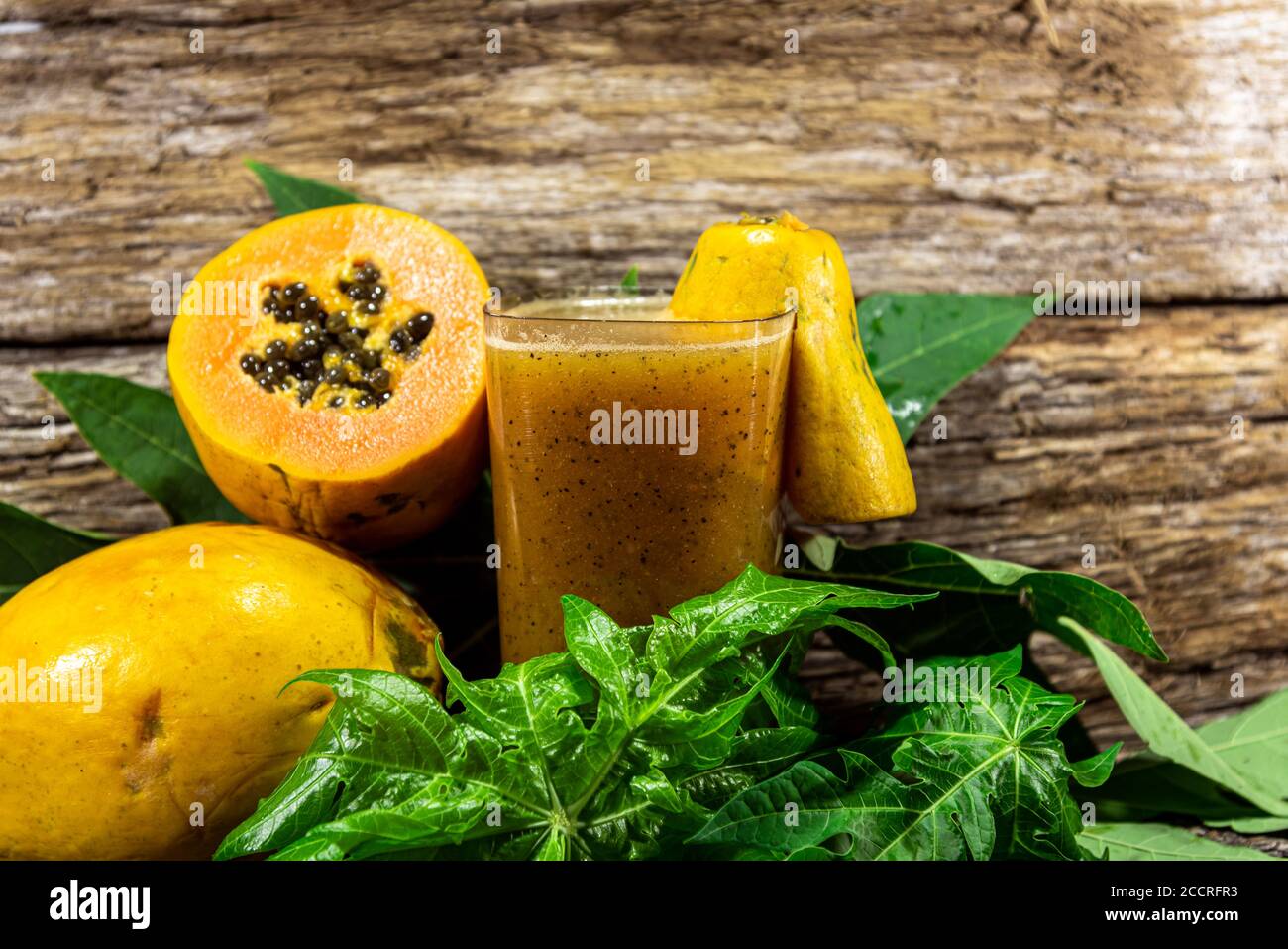Formosa papaya juice and fruits, a typical Brazilian variety of common ...