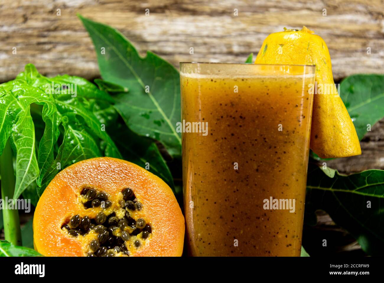Formosa papaya juice and fruits, a typical Brazilian variety of common ...