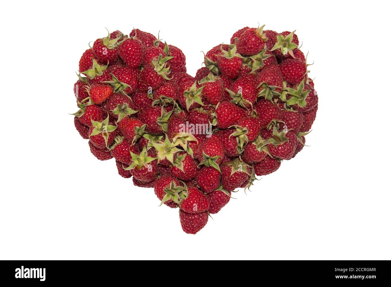 Raspberry heart made from berries. Isolated on a white background ...