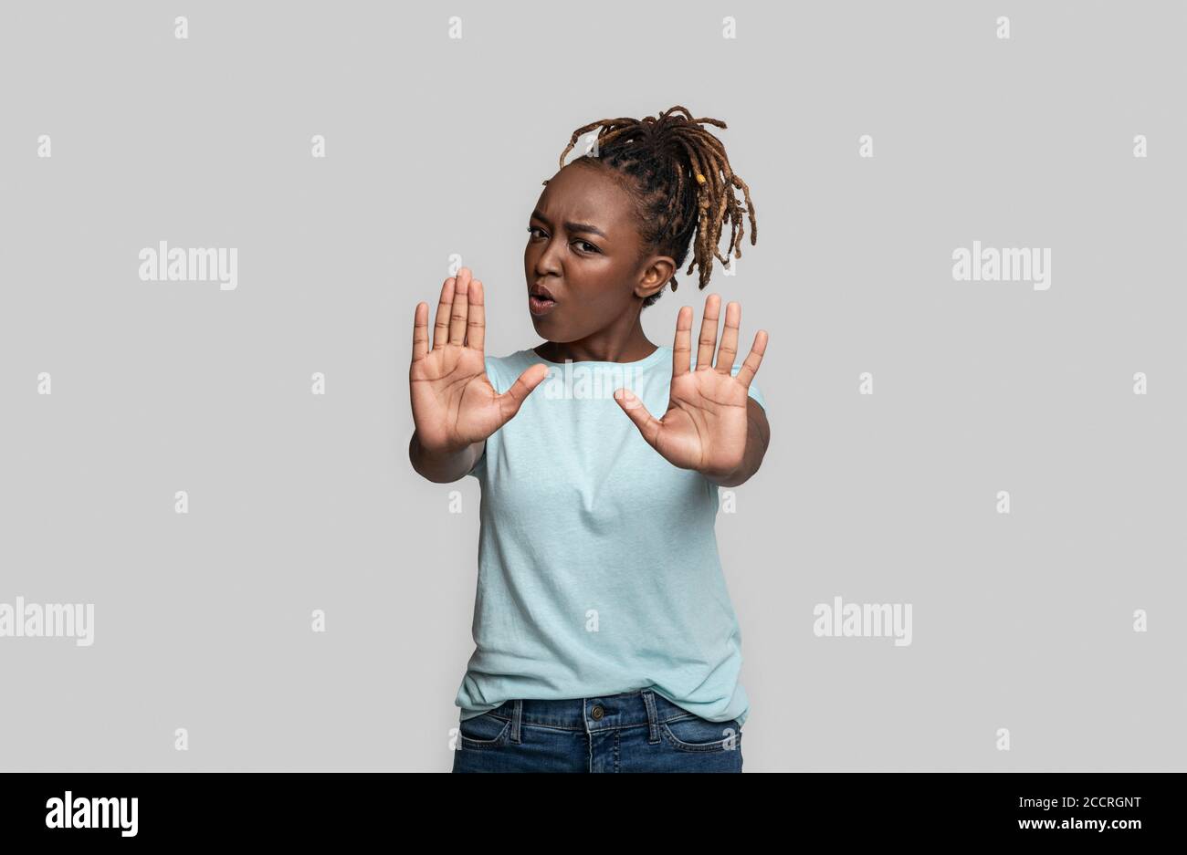 Indignant young black woman showing no gesture Stock Photo - Alamy