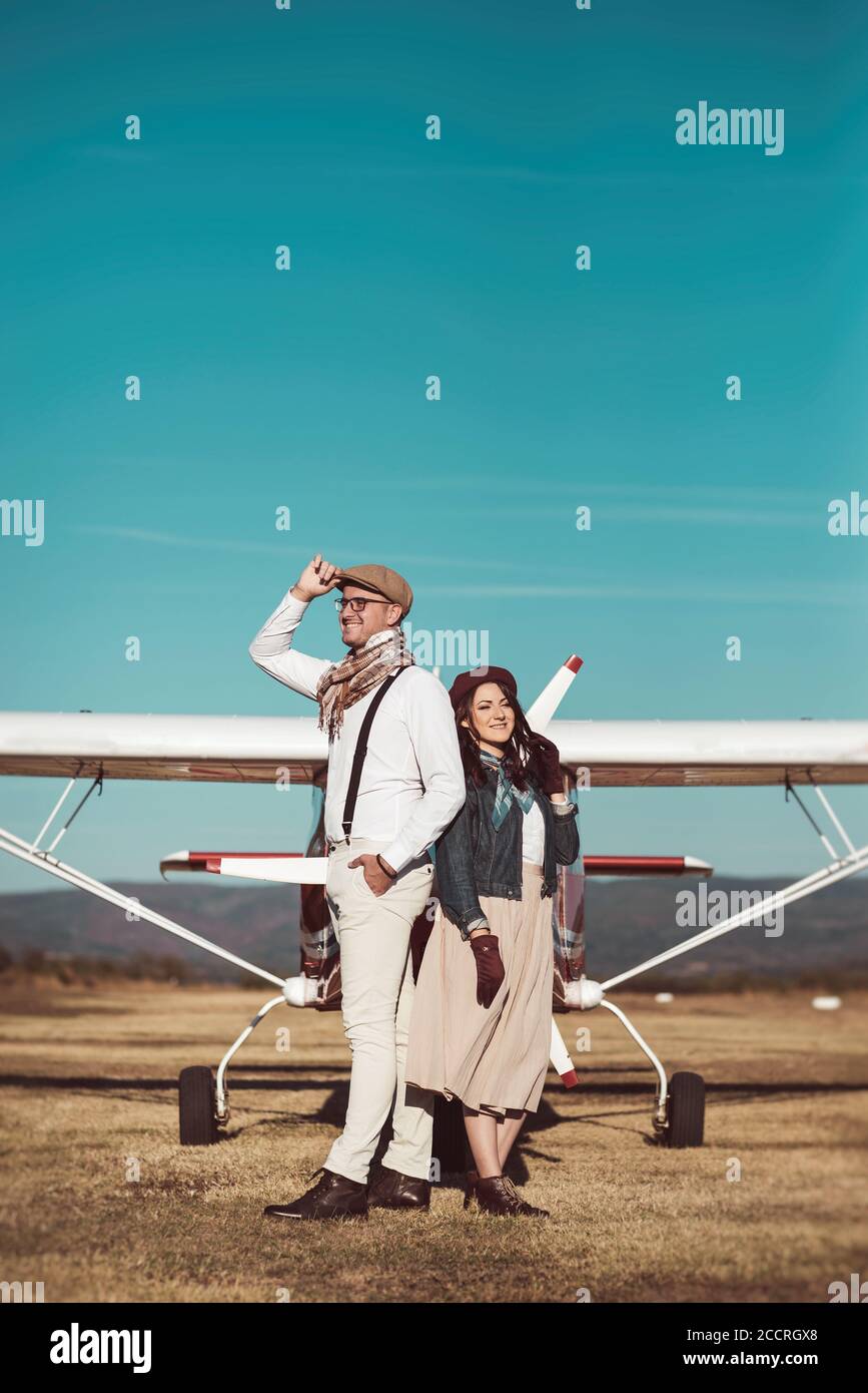 Airplane couple young flight trip hi-res stock photography and images ...