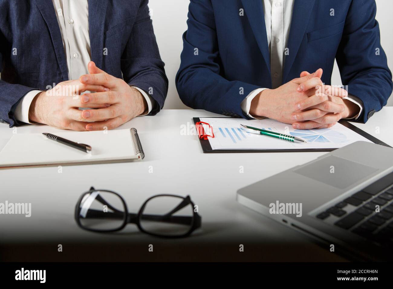 Business people discussing the charts and graphs showing Stock Photo ...