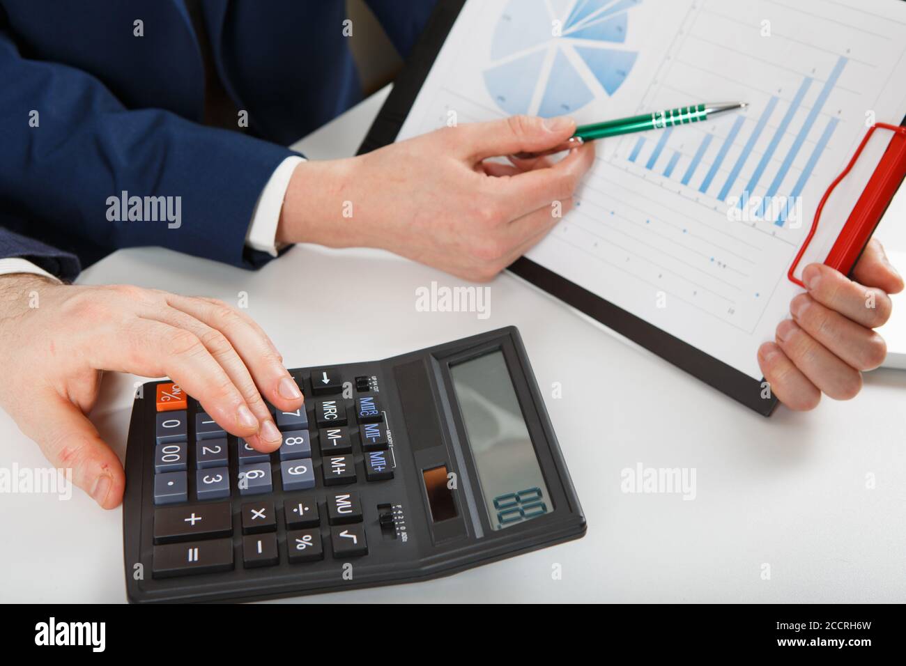 Business people discussing the charts and graphs showing Stock Photo ...