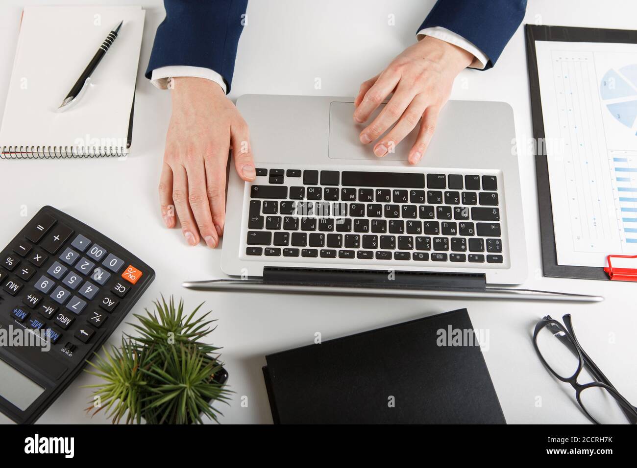 Overhead view of businessman working at computer Stock Photo - Alamy