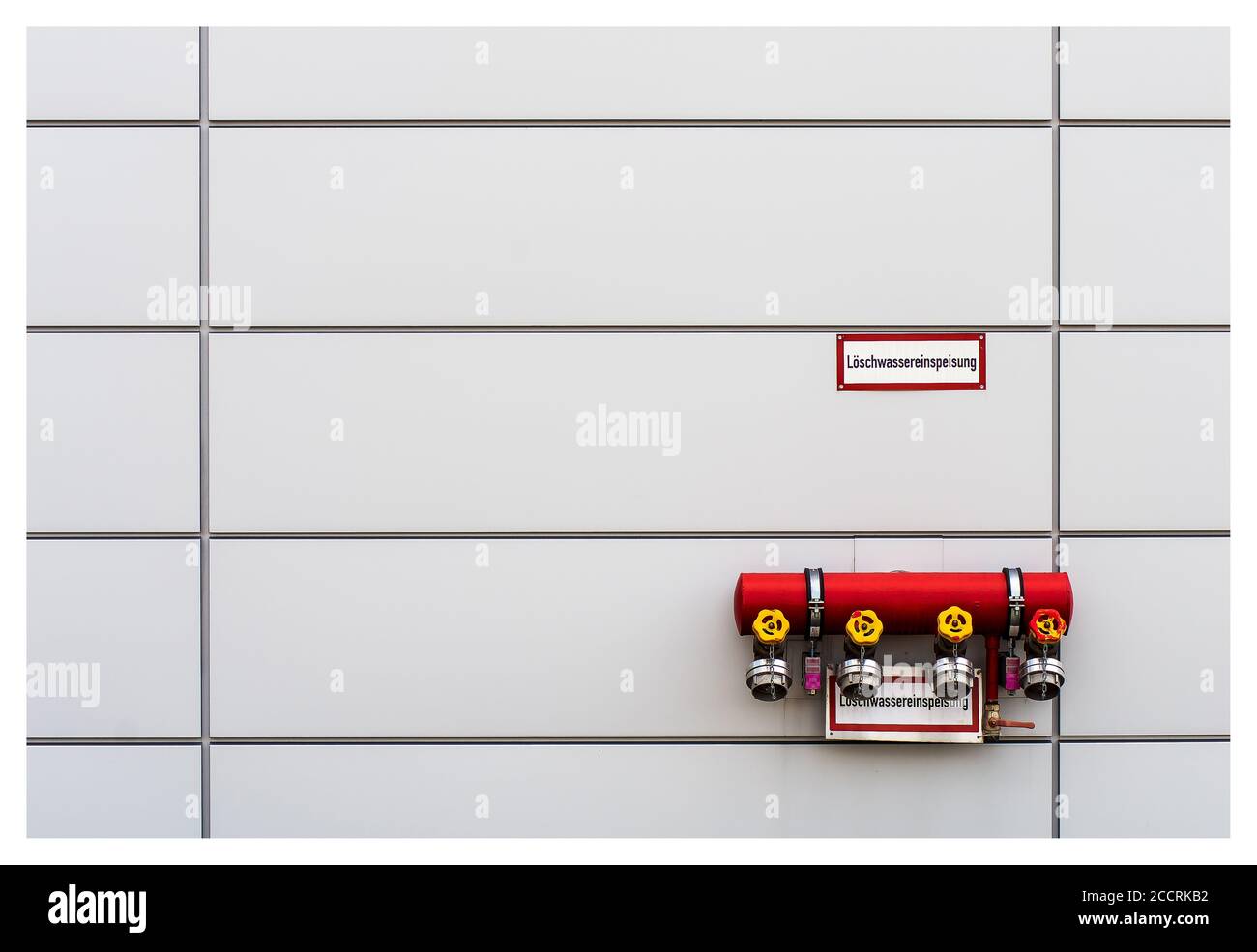 Beautiful shot of a red water pipe with four waterways on a modern ...