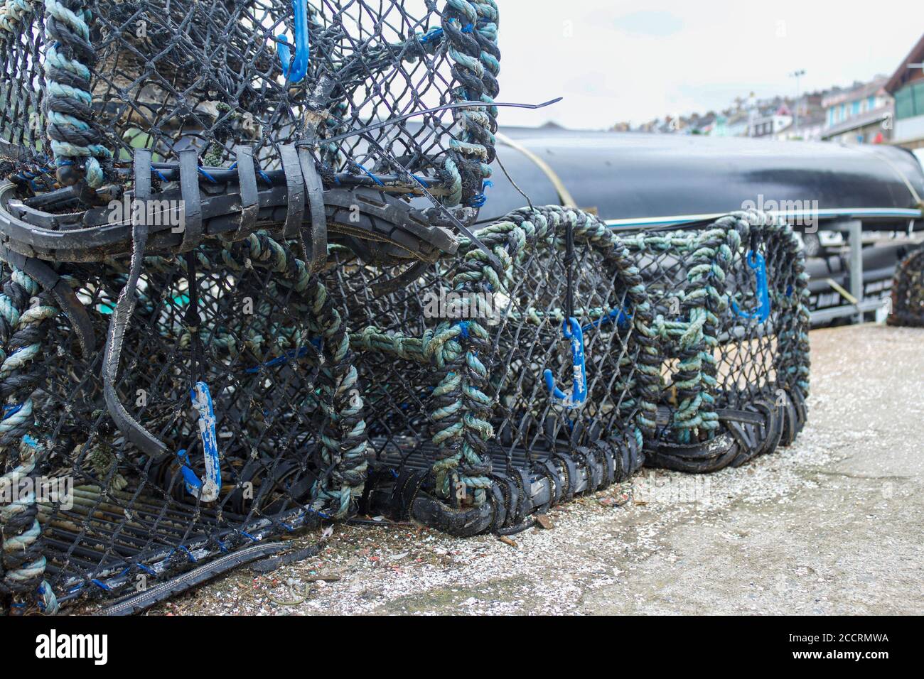 Lobster/crab pots drying on harbour Stock Photo - Alamy