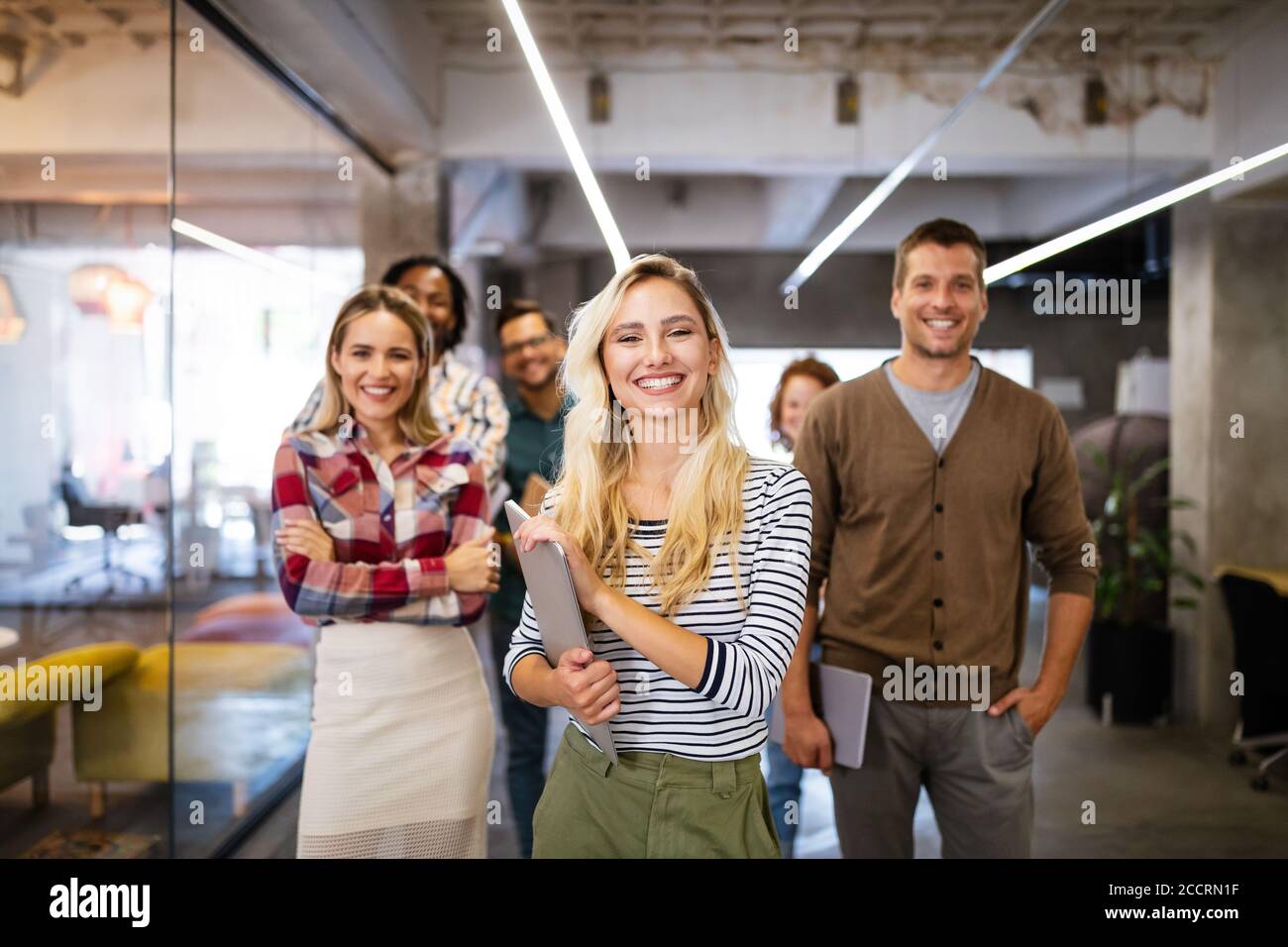 Successful group of designers, business people at work in office Stock ...