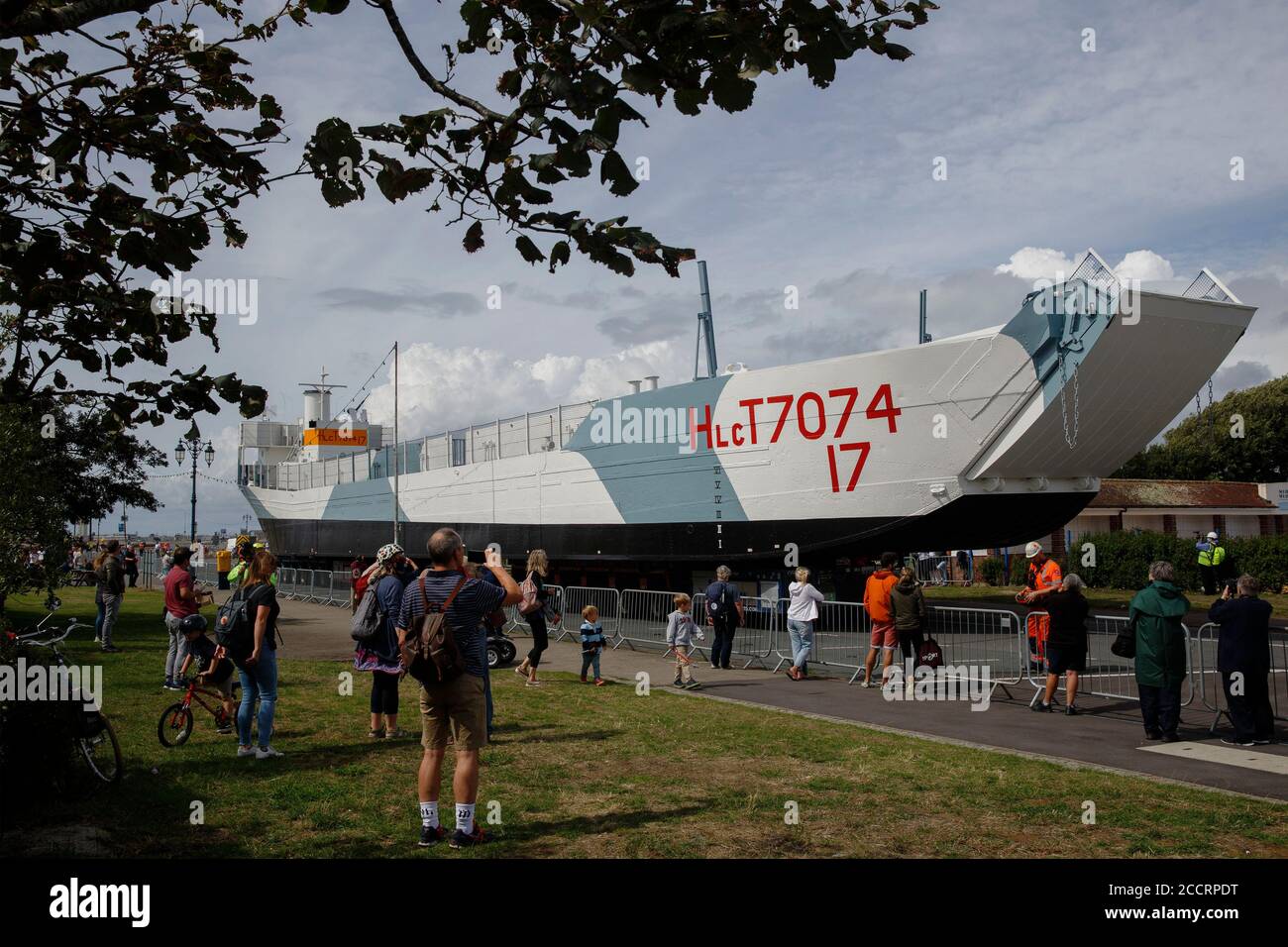 Portsmouth, Hampshire, UK. 24th Aug 2020. People watch the LCT 7074 ...