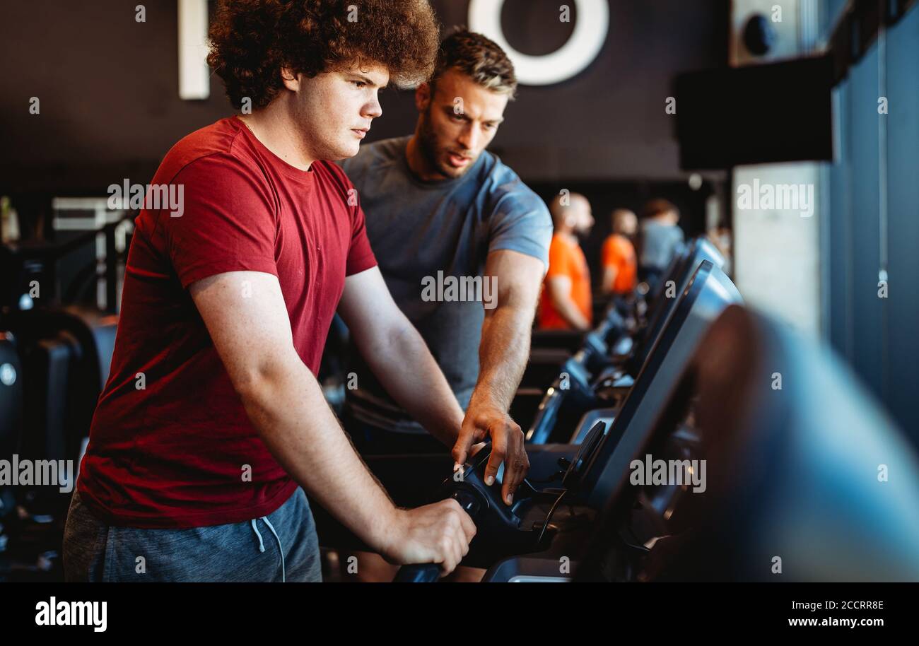 Fat man gym hi-res stock photography and images - Alamy