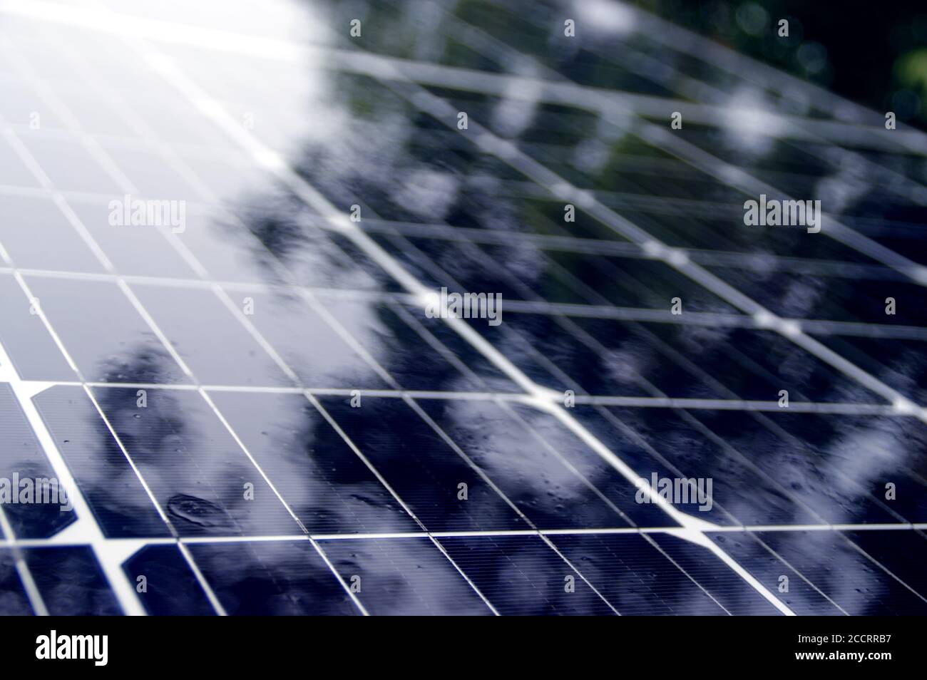 Wet solar panels on the roof. Photovoltaics at home in the rain Stock ...