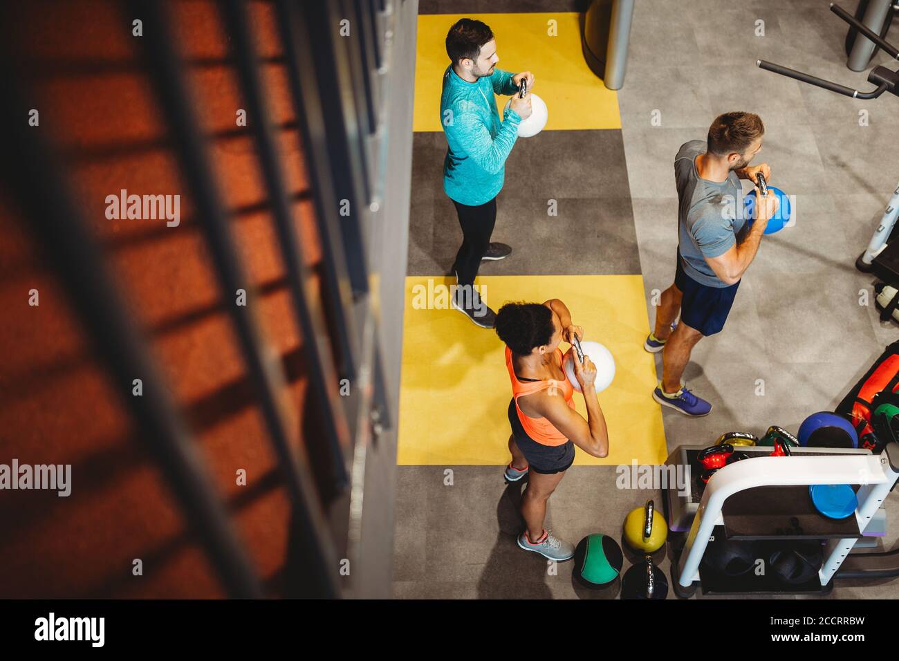 Fit people working out in fitness class at the gym Stock Photo - Alamy