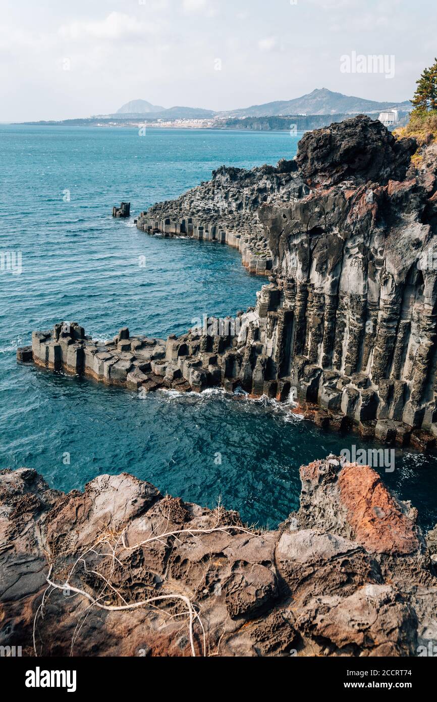 Daepo Jusangjeolli Cliff Columnar Joints and sea in Jeju Island, Korea ...