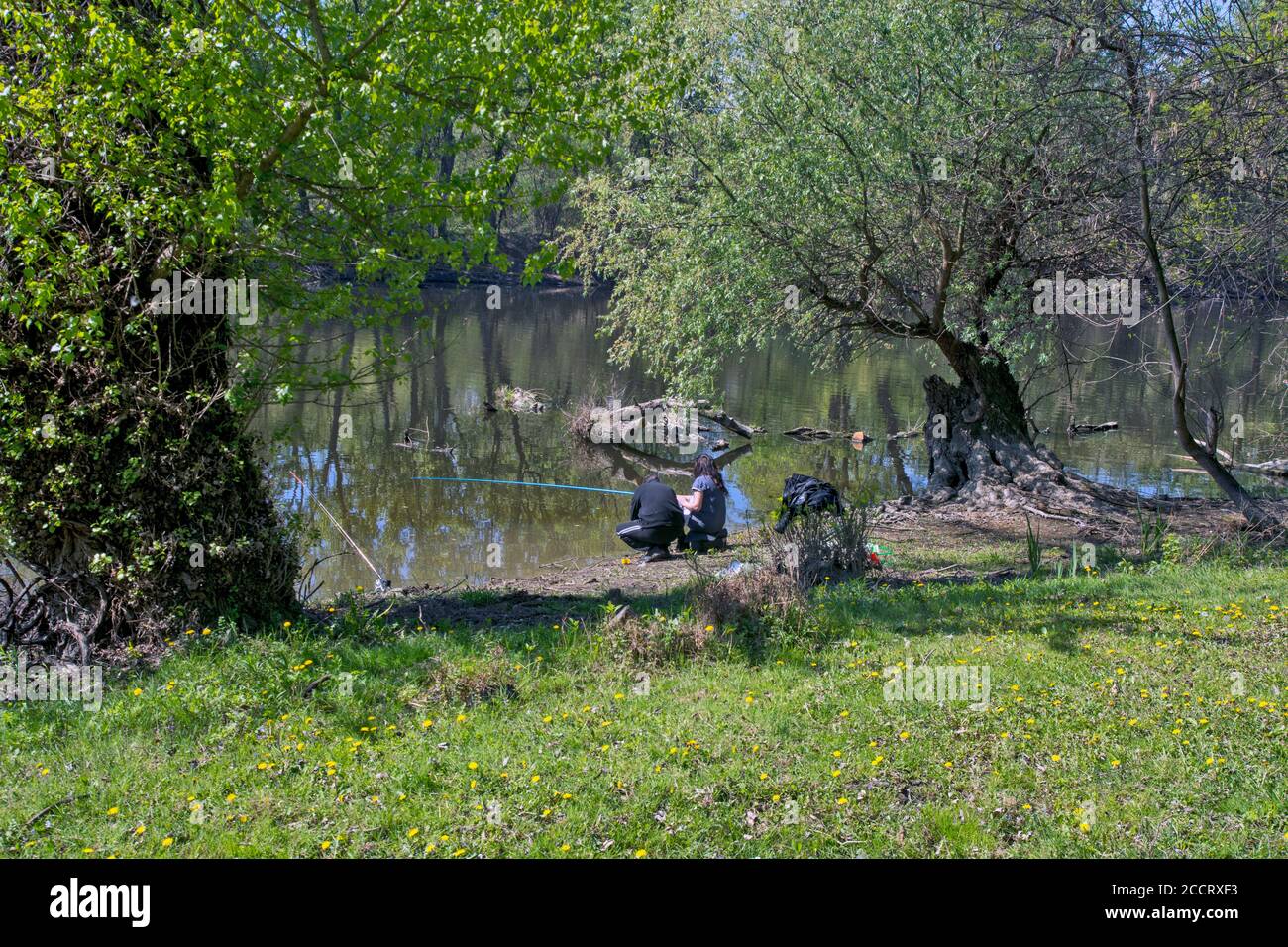 Fisherman from shore lake fishing hi-res stock photography and images ...