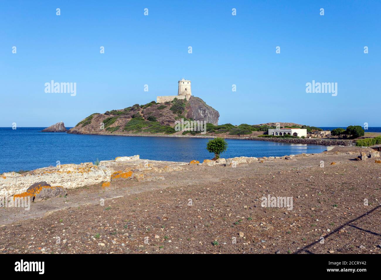 The archaeological site of Nora with the Spanish tower in the ...