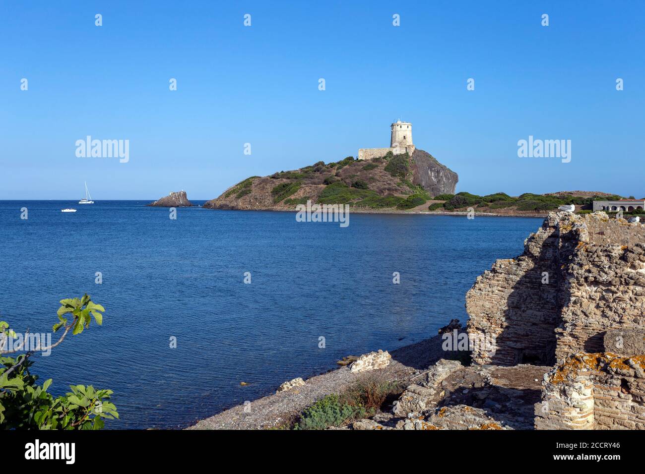 The archaeological site of Nora with the Spanish tower in the ...