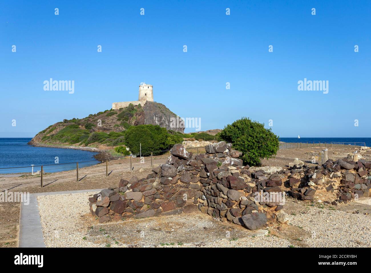 The archaeological site of Nora with the Spanish tower in the ...