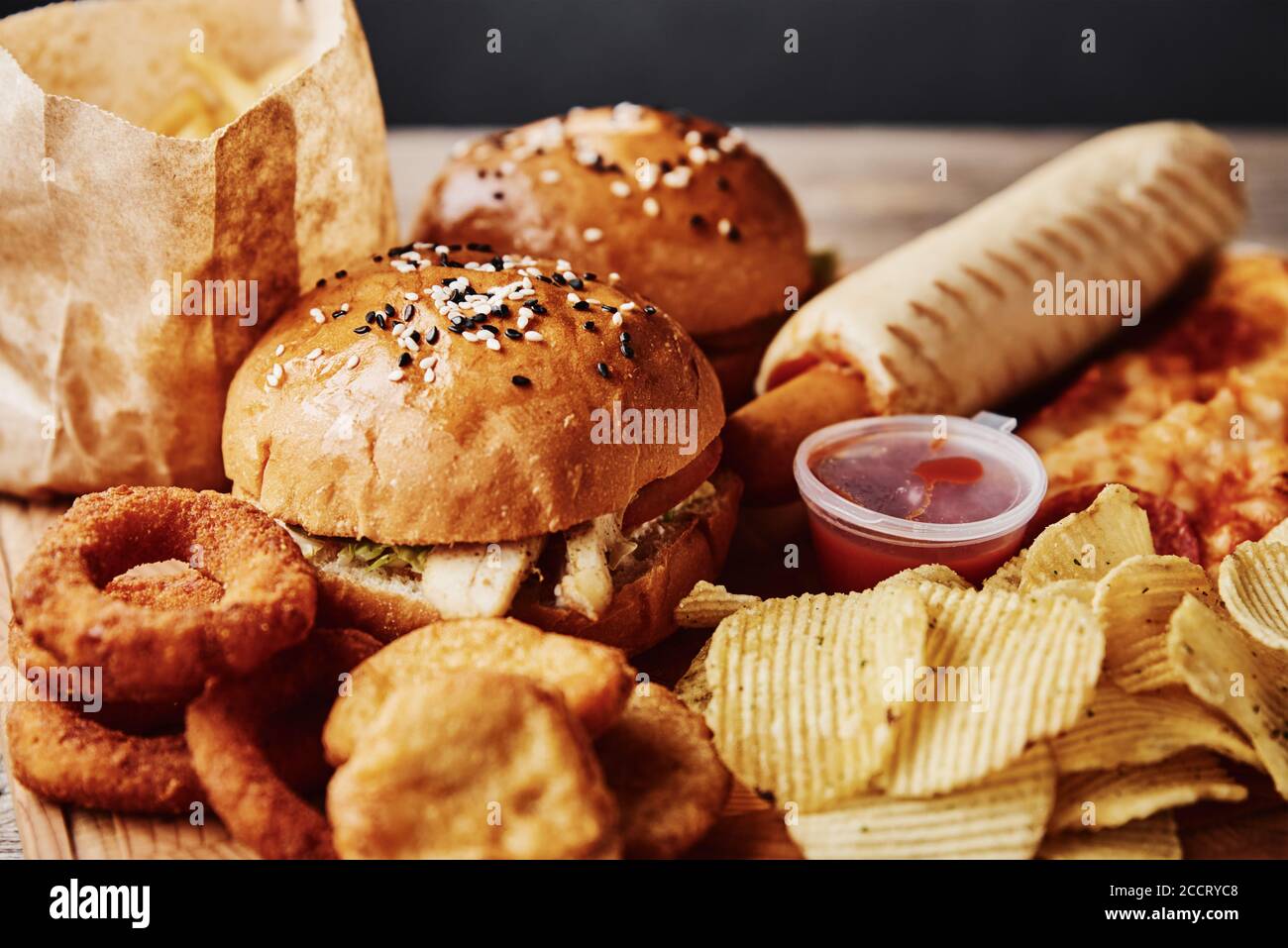 Unhealthy And Junk Food Different Types Of Fastfood And Snacks On The Table Close Up Takeaway