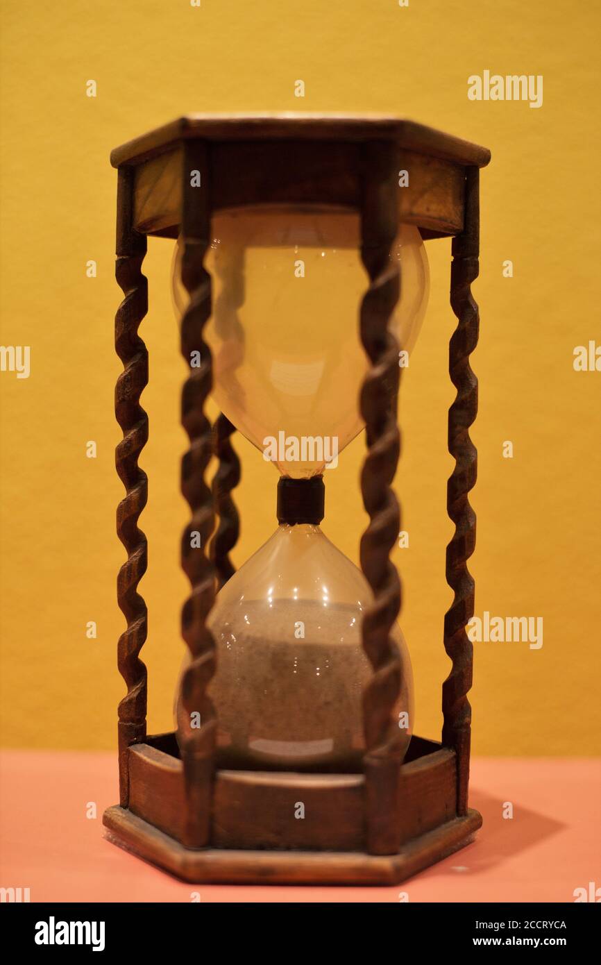 An antique half hour sand glass Stock Photo - Alamy