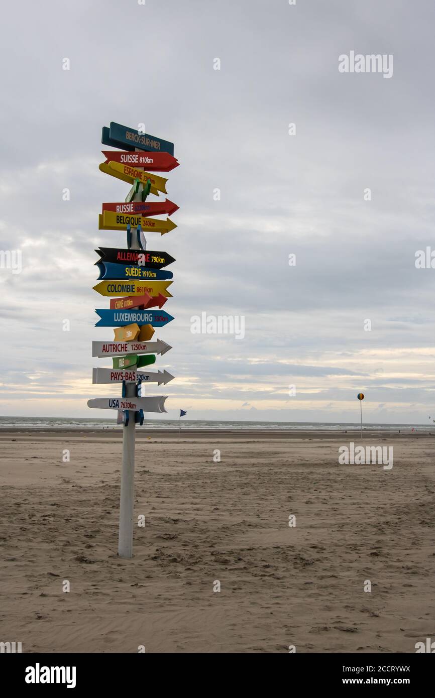 Colorful signs on the beach in summer Stock Photo - Alamy