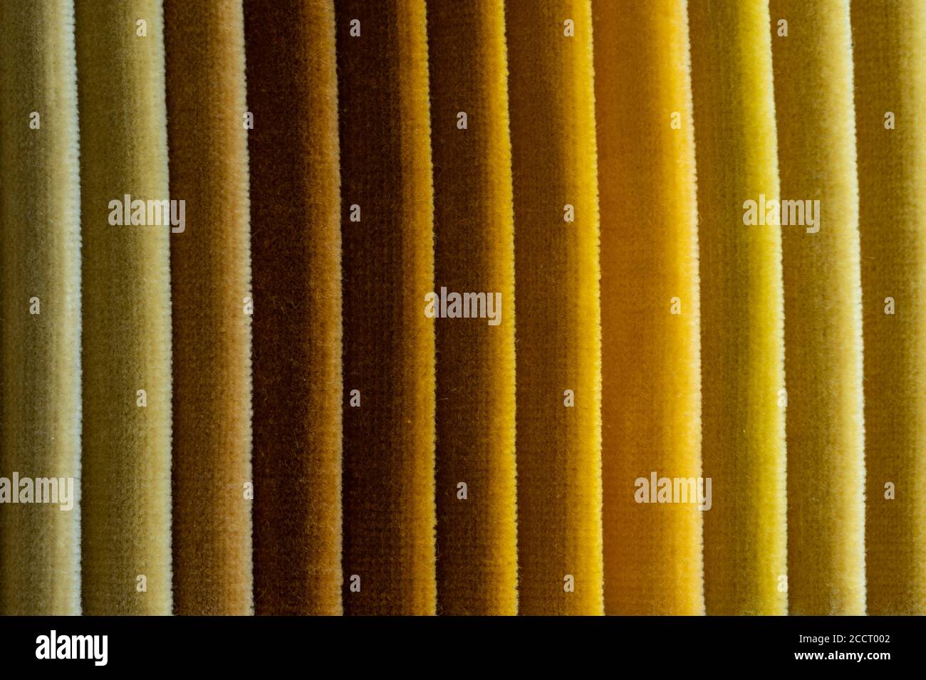 Abstract folded yellow-colored velvet fabric Stock Photo - Alamy