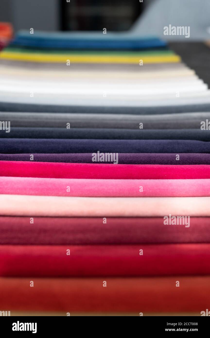 Folded soft luxury velvet samples placed in a row on a table Stock ...