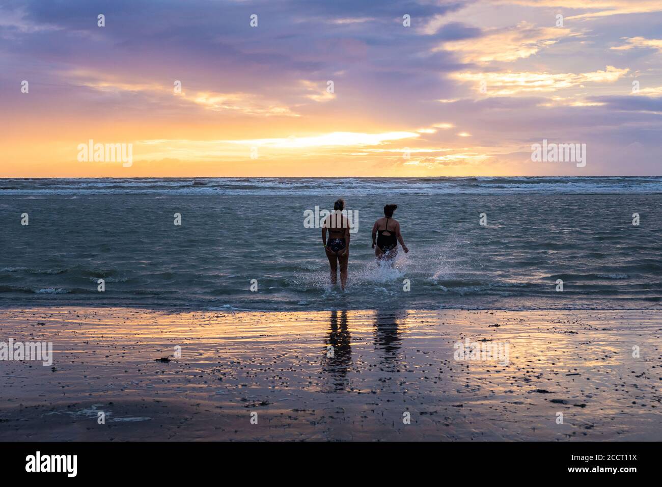 Shoreline reflection sand sunset hi-res stock photography and images ...