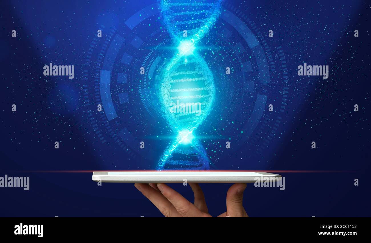 Decoding human genome. Male hand holding tablet computer with DNA helix ...